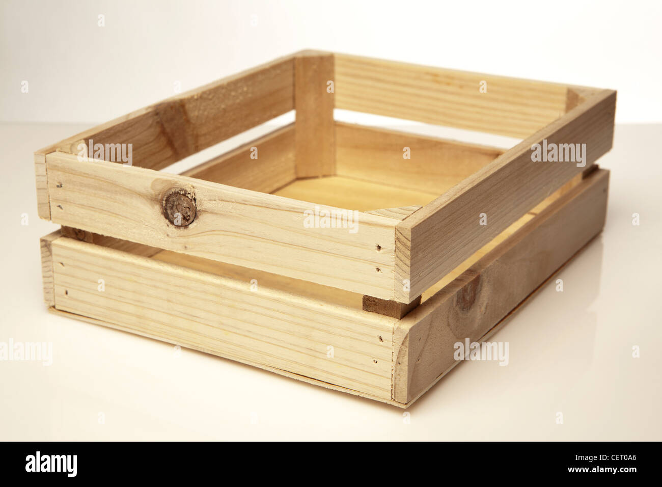 small wooden model crate on white background Stock Photo - Alamy