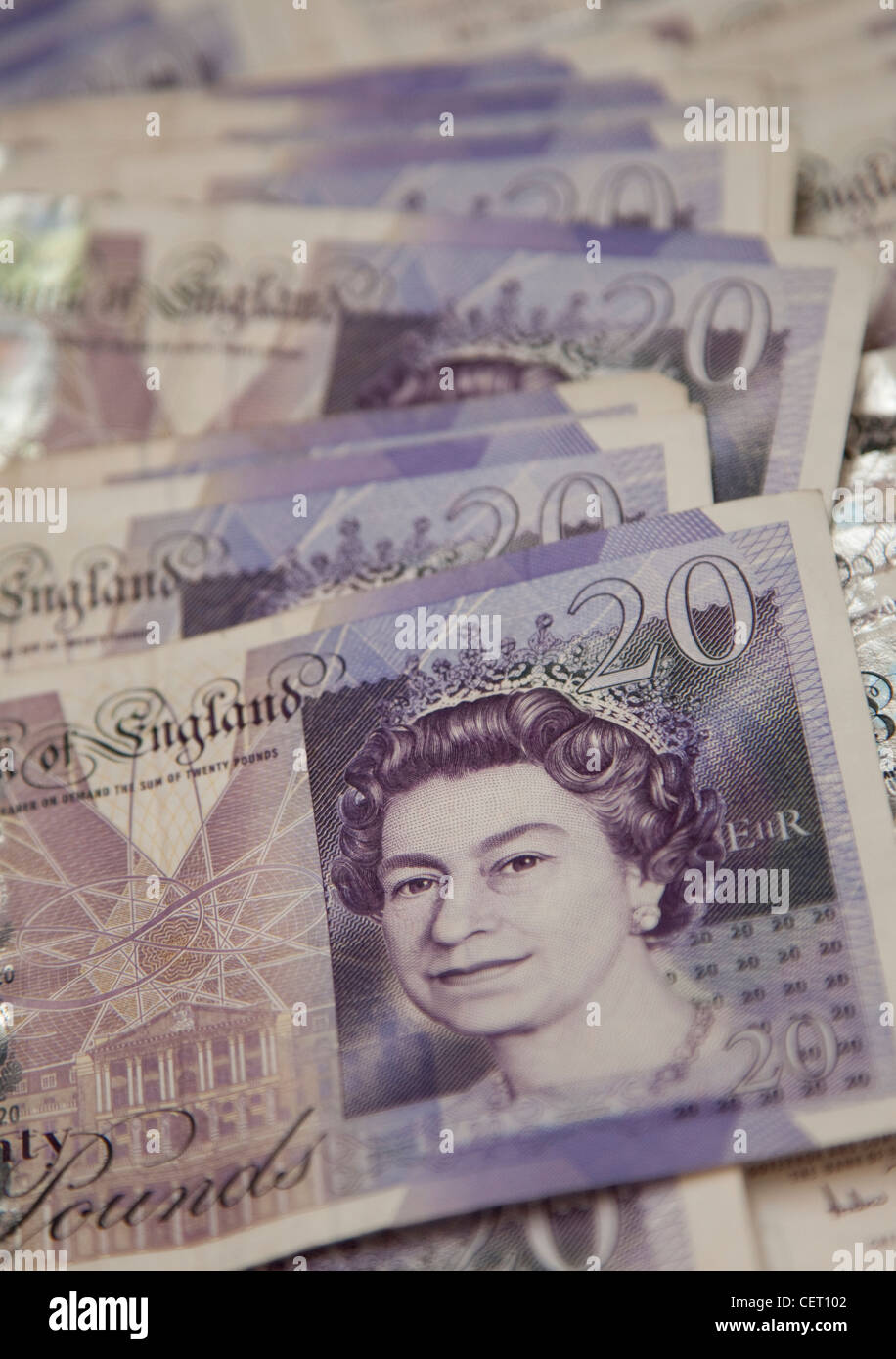 Pounds sterling bundle cash money hi-res stock photography and images ...