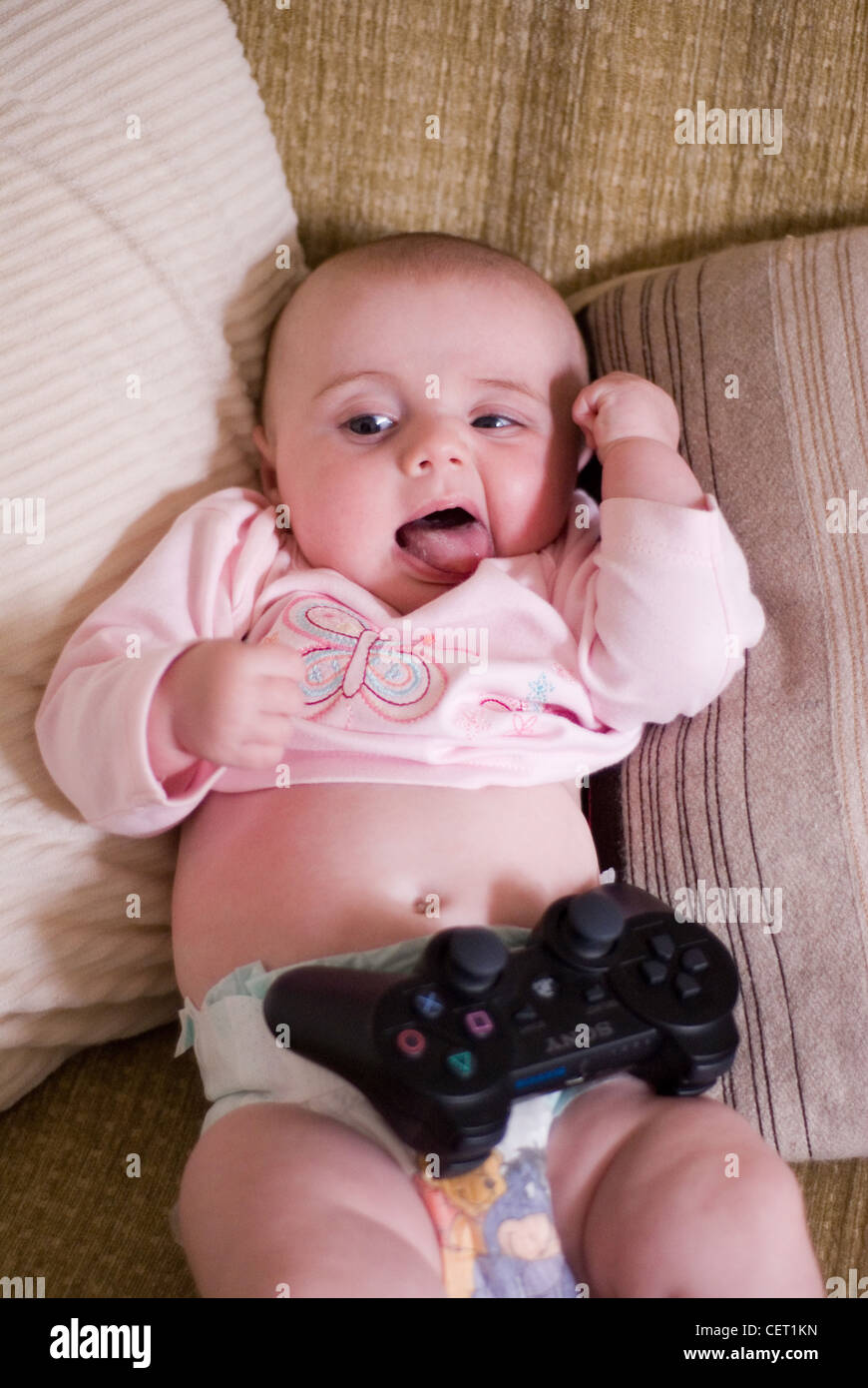 Pink controller hi-res stock photography and images - Alamy