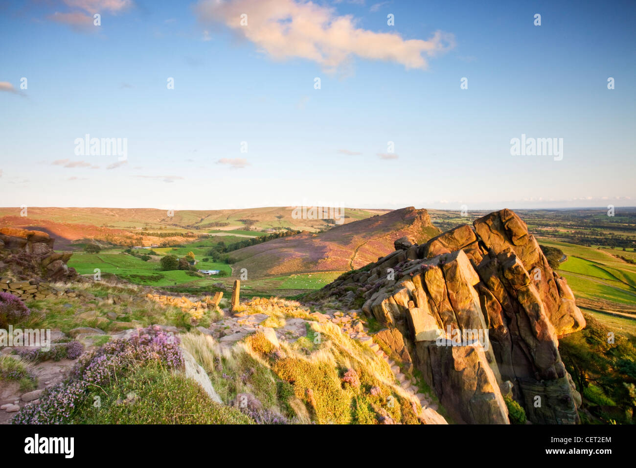 The Roaches, a wind-carved outcrop of gritstone rocks, illuminated by ...