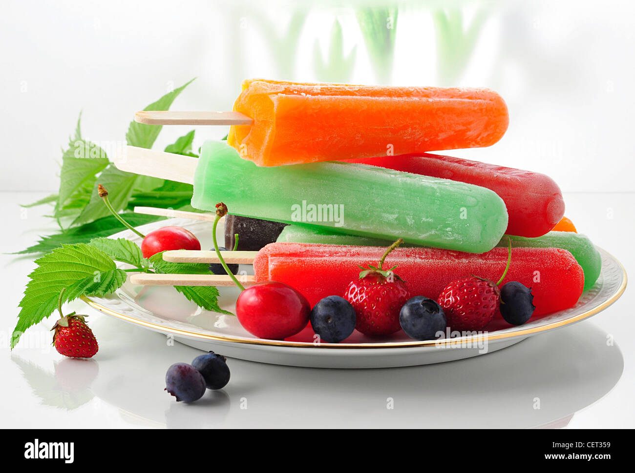 colorful ice cream pops on a plate Stock Photo - Alamy