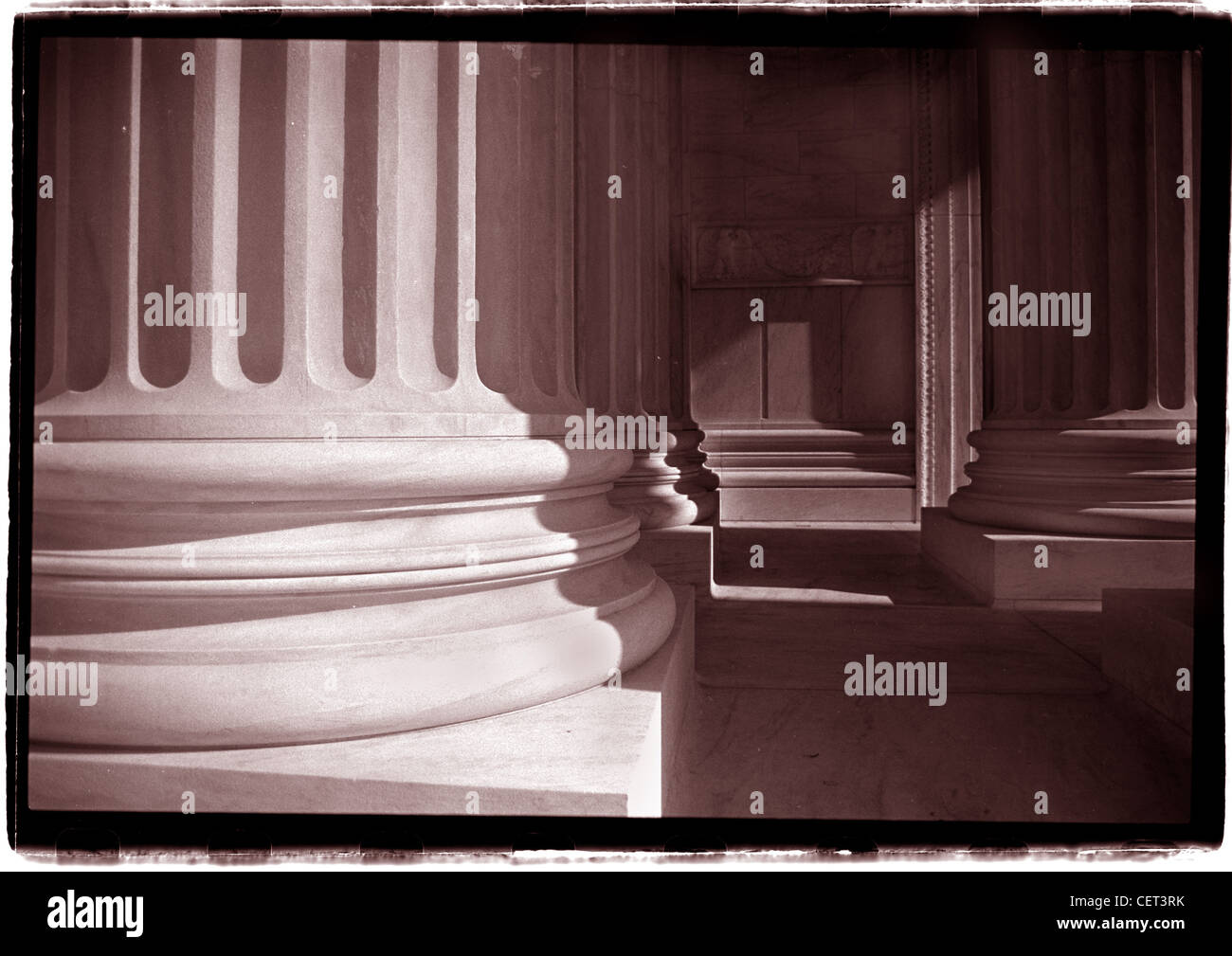 Classic Corinthian style columns, horizontal sepia toned photo. No ...