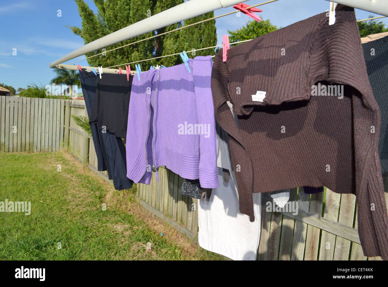 Clothes on clothesline outdoors Stock Photo - Alamy