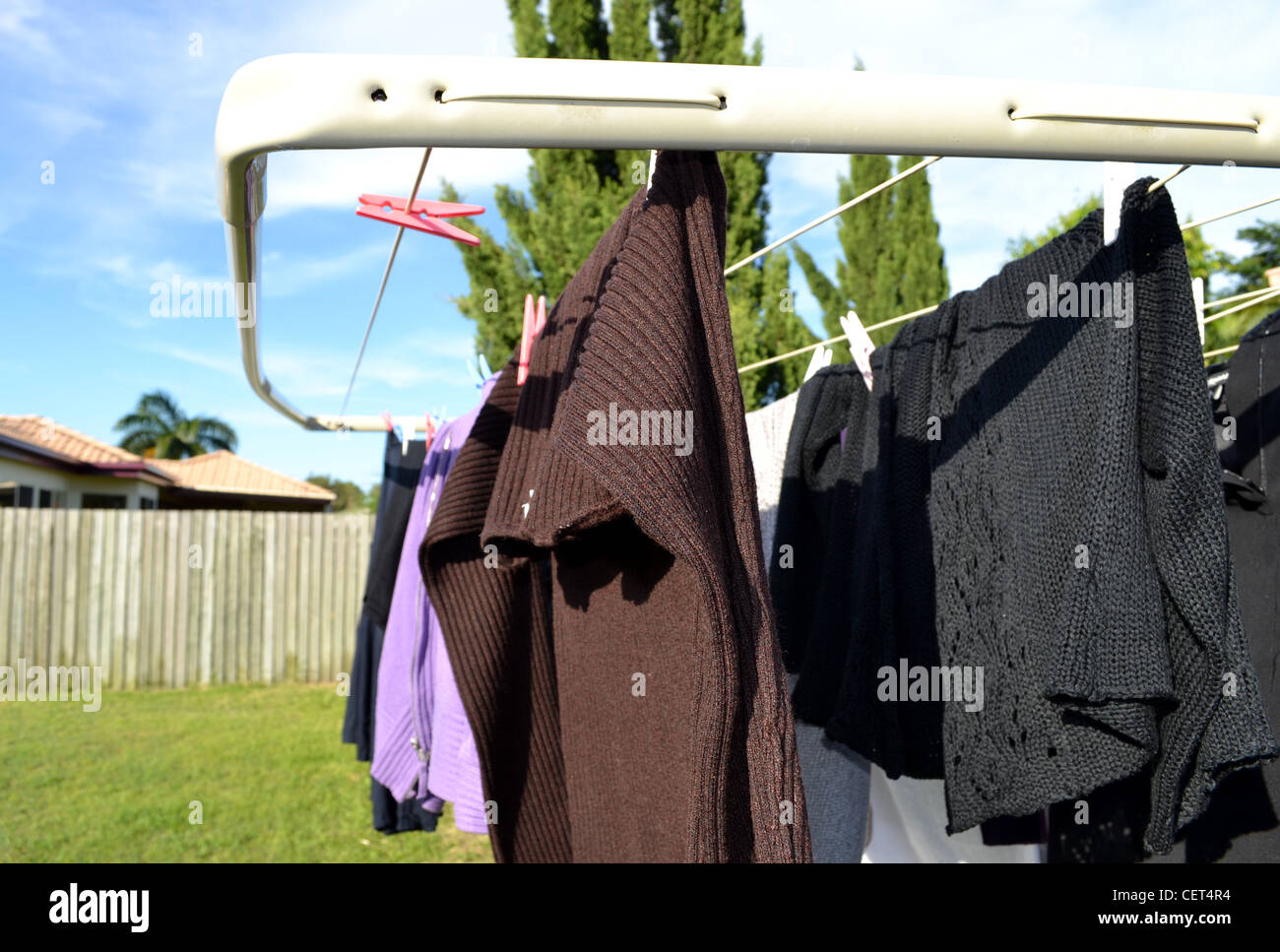 Clothes on clothesline outdoors Stock Photo - Alamy
