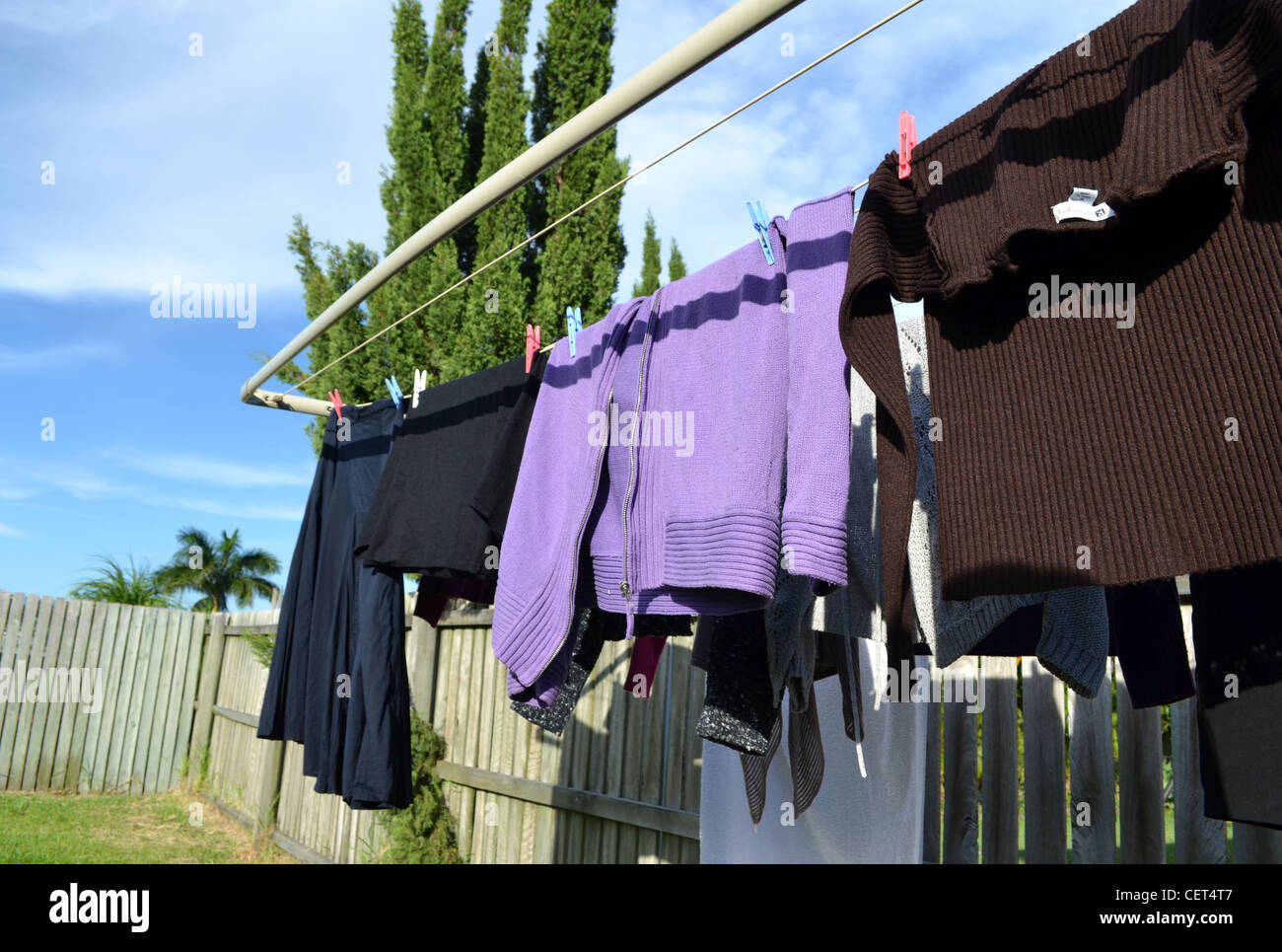 Clothes on clothesline outdoors Stock Photo - Alamy