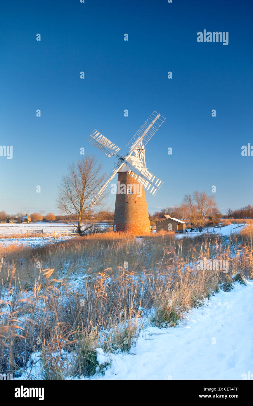 Snow on the ground around the newly restored Hardley Drainage Mill ...