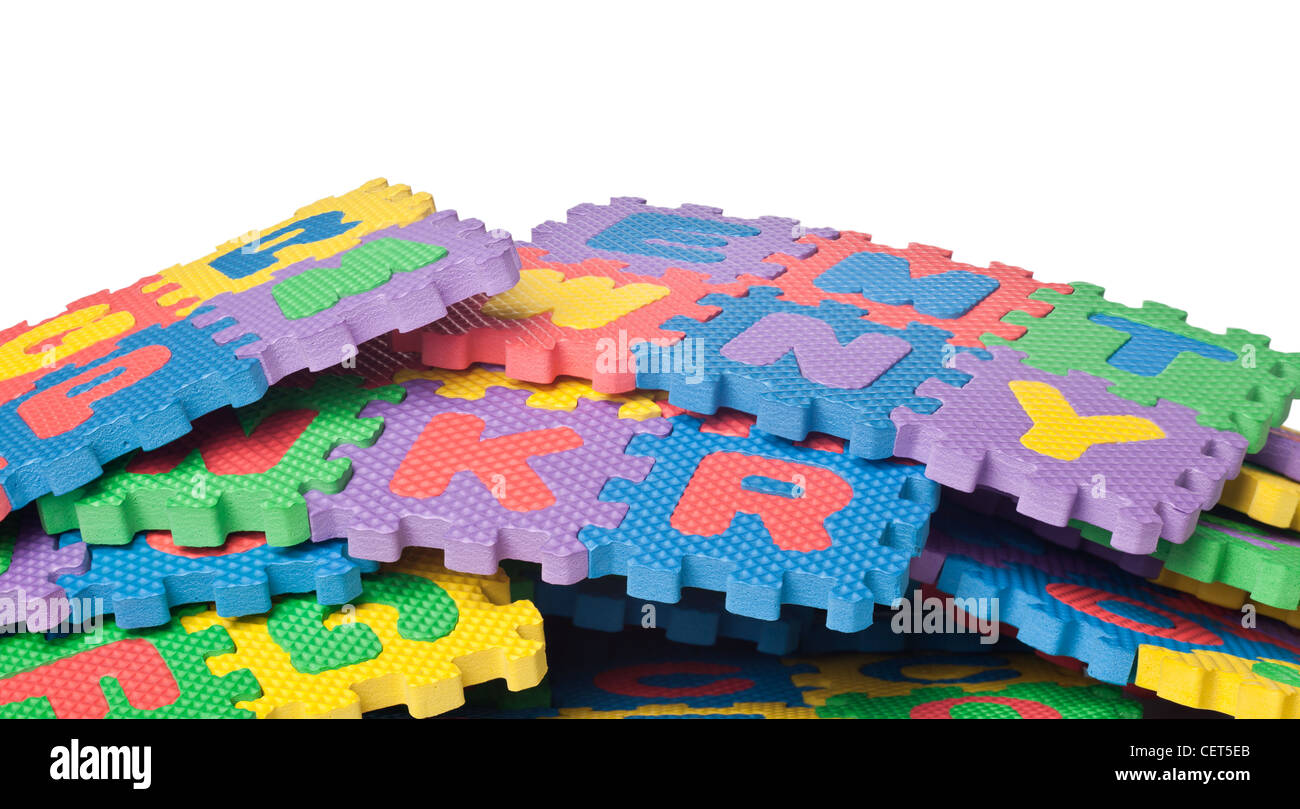 Pile of colorful alphabet blocks against white background Stock Photo ...