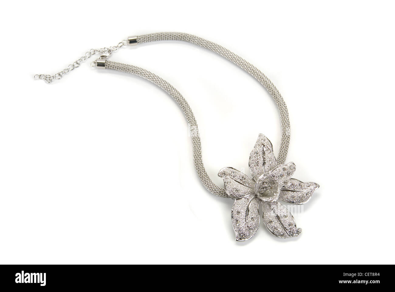 Flower shaped pendent with a silver chain Stock Photo - Alamy