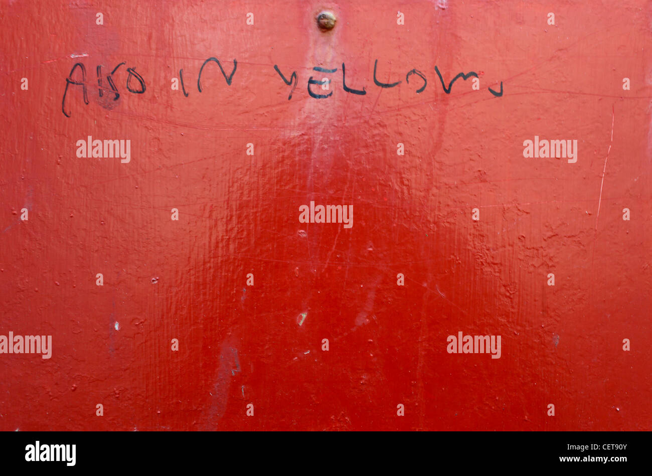 Text Graffiti on red wall Stock Photo - Alamy