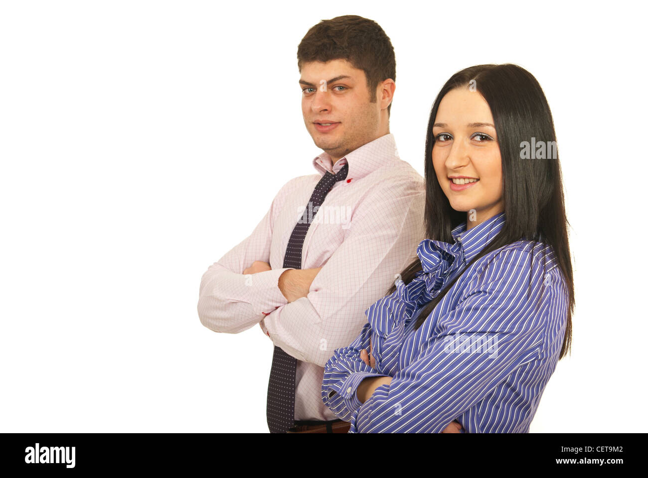 Young business team of two people standing with arms folded isolated on ...