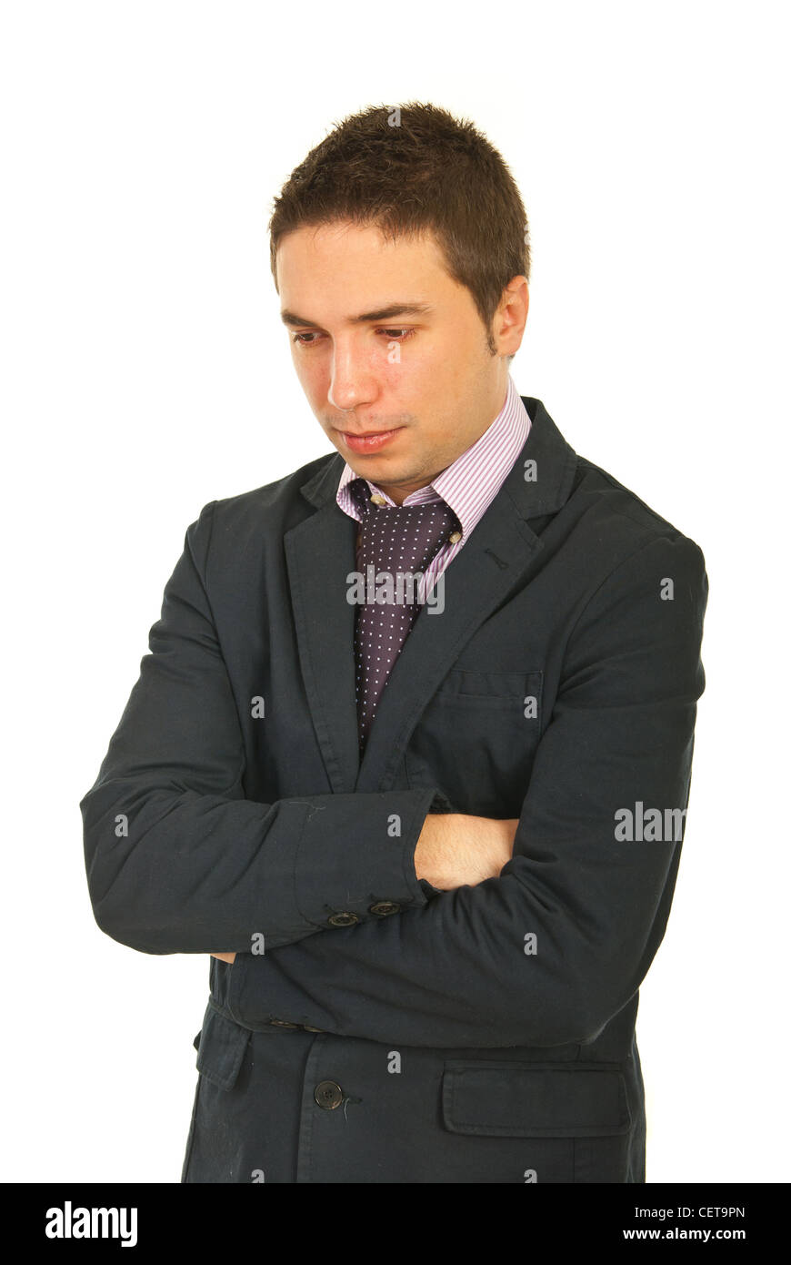 Sad thinking business man looking down isolated on white background ...
