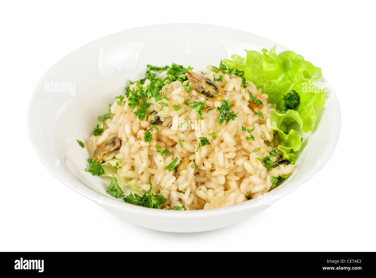 risotto with seafood isolated on a white Stock Photo - Alamy