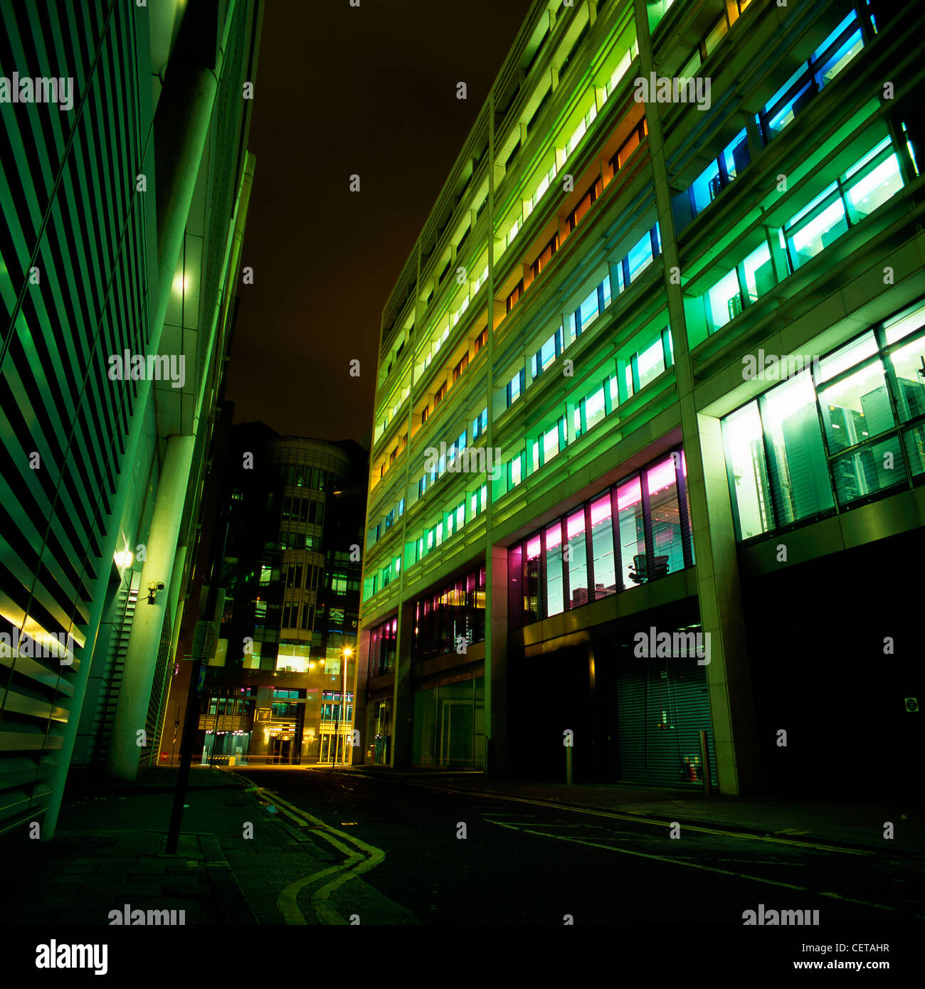 Coloured building in Moorgate at night. Moorgate was one of the minor ...