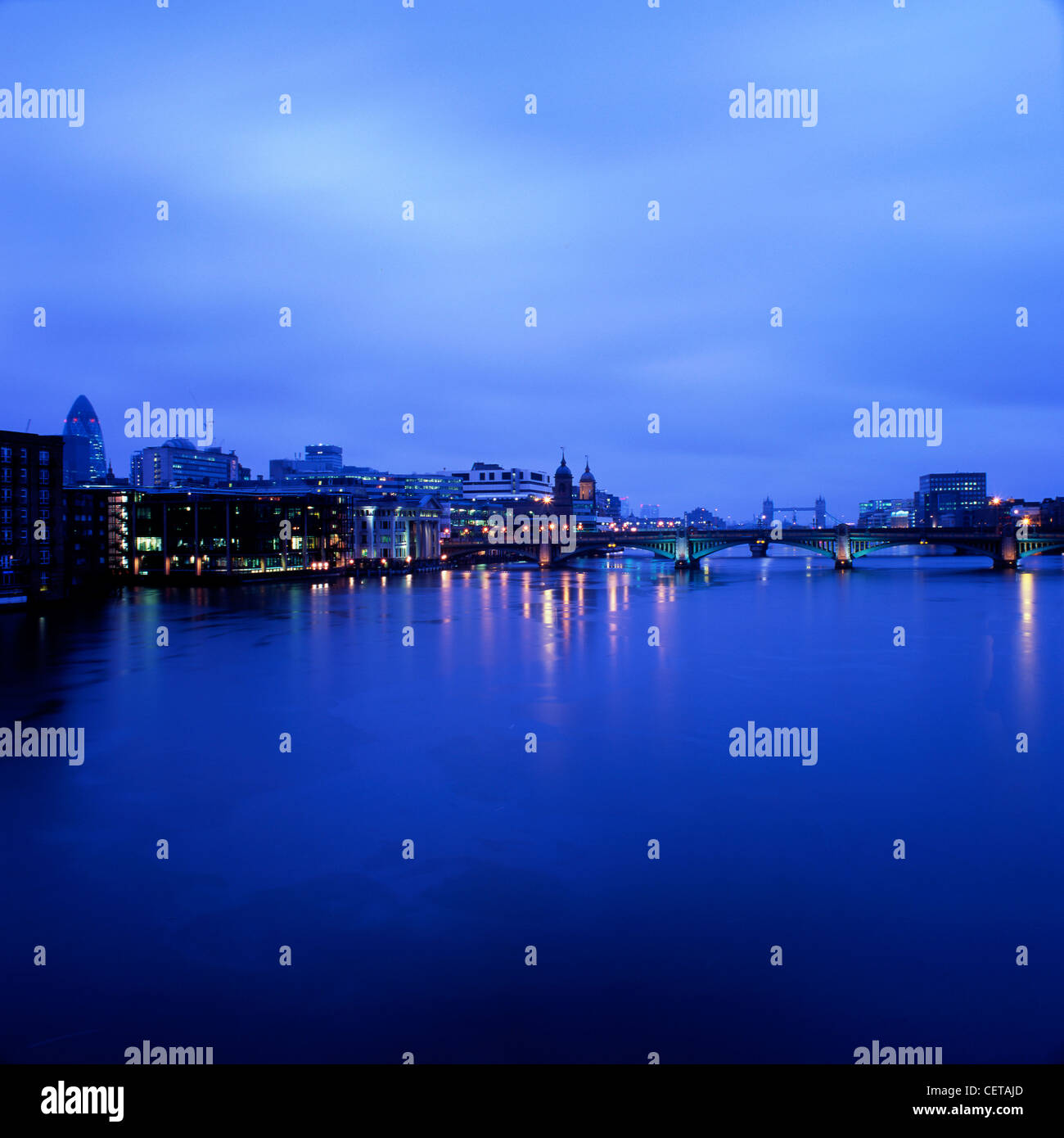 River Thames with Southwark Bridge at dawn. Southwark Bridge was ...
