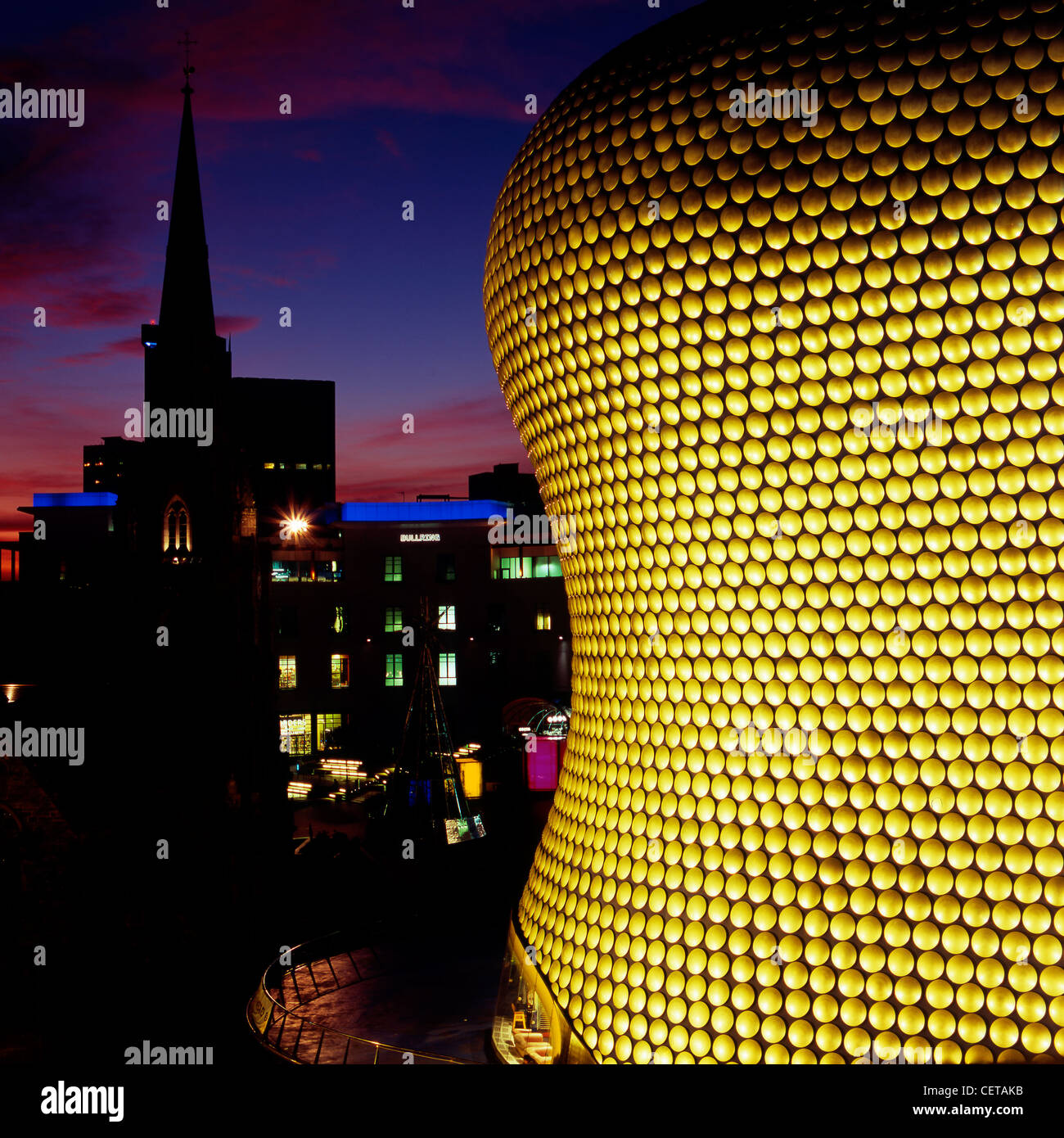 Exterior of Selfridges at night. Completed in 2003 it constitutes part ...