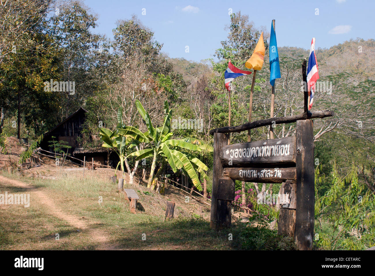 A sign on a trail marks way to the Thailand Burma (Myanmar) Border ...