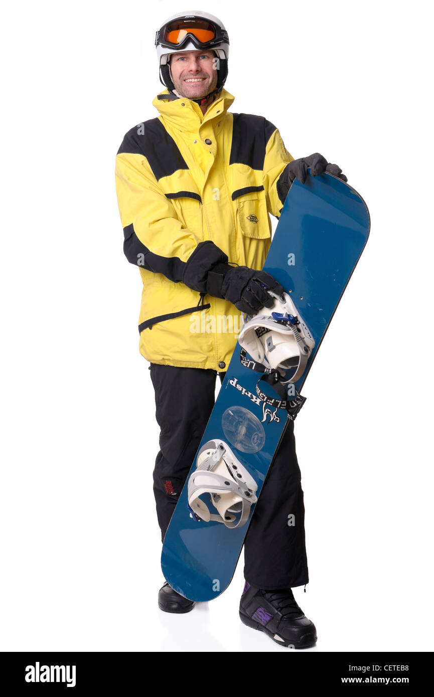 Young man with snowboard in front of white background Stock Photo - Alamy