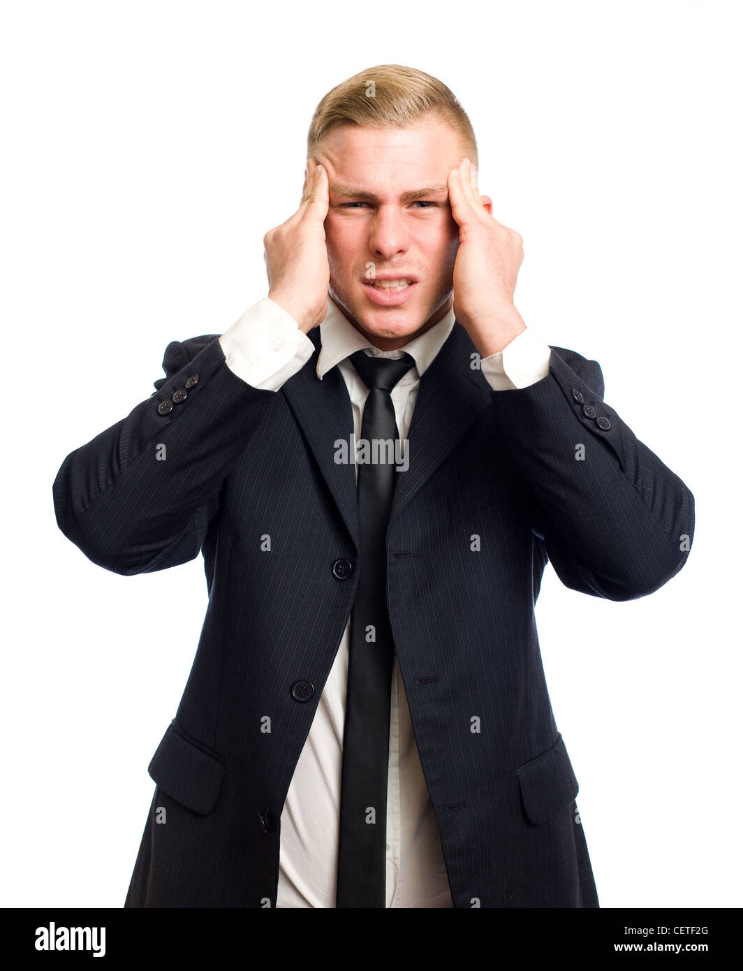 Extremely frustrated looking elegant young busniessman on white ...