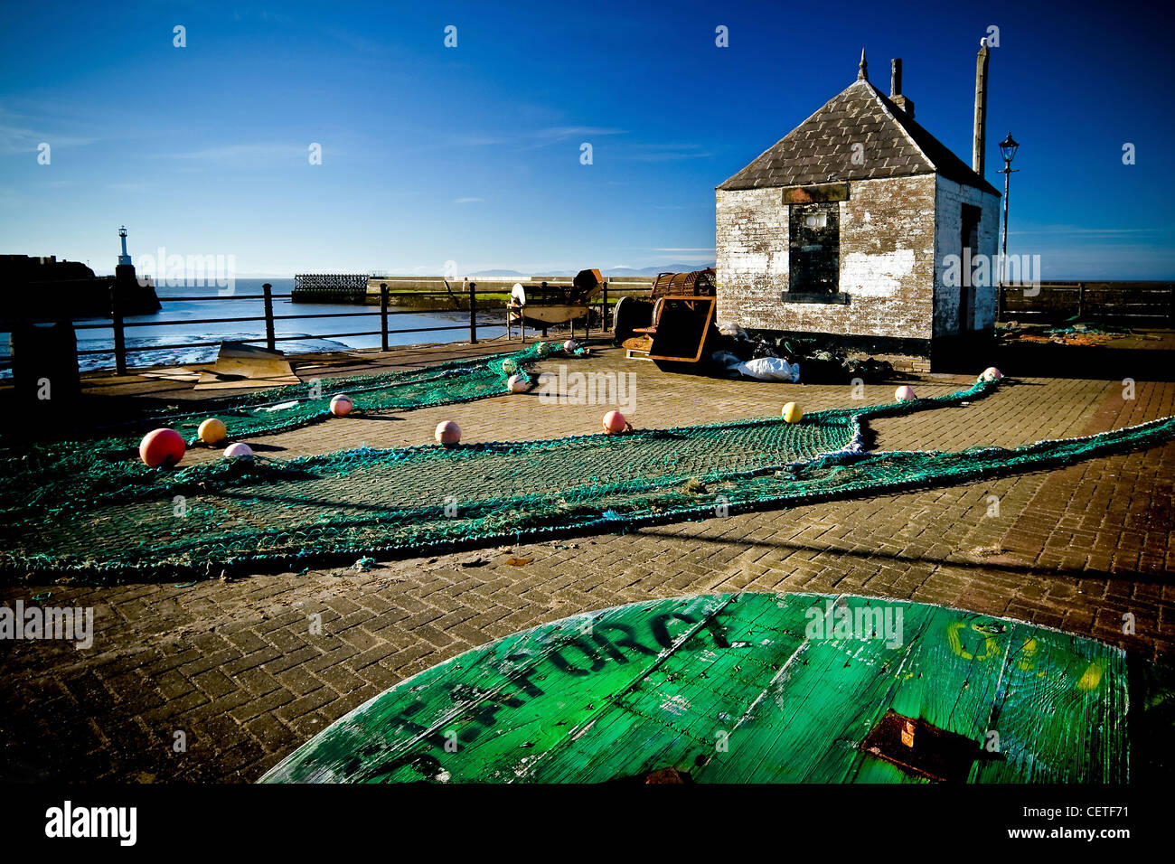 Fishing nets laid out on the floor at Maryport Harbour Stock Photo - Alamy