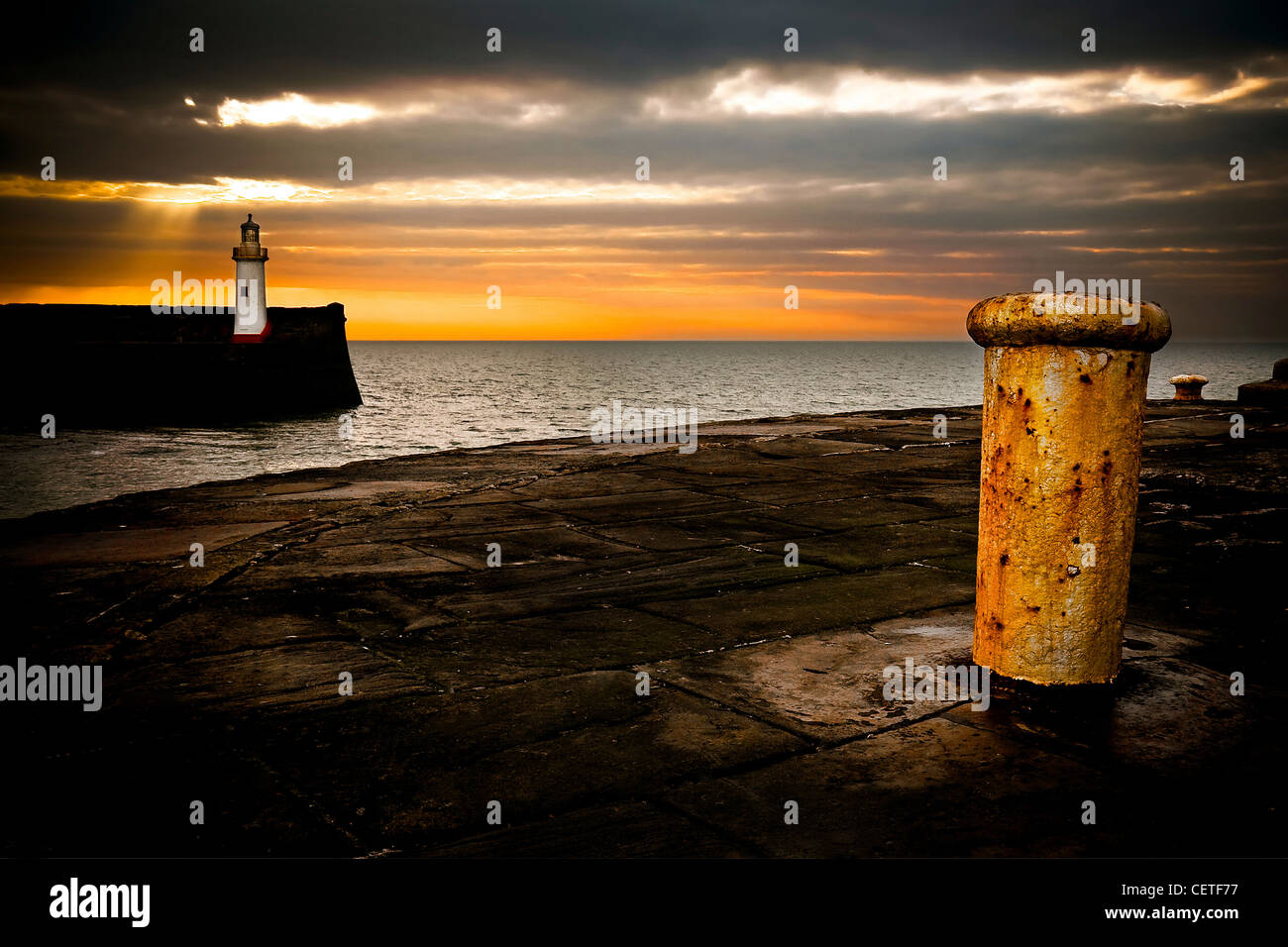 A view of the lighthouse at sunset in Whitehaven Stock Photo - Alamy