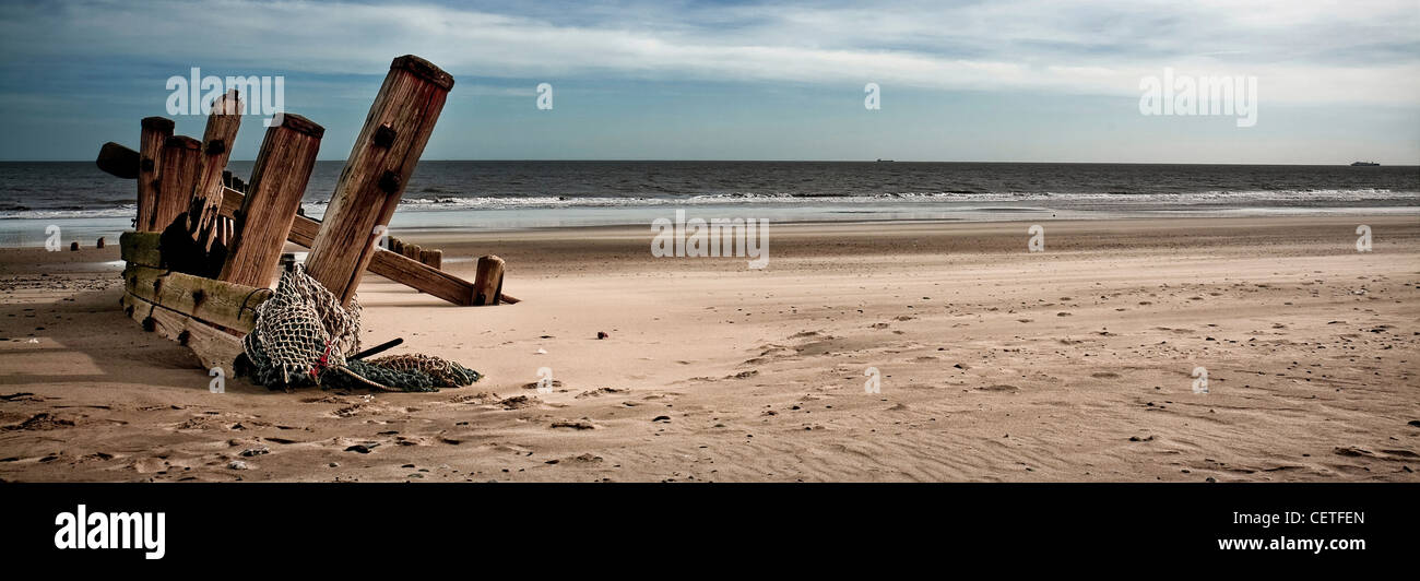 View of old water breakers and the sandy beach at Spurn Point Stock ...