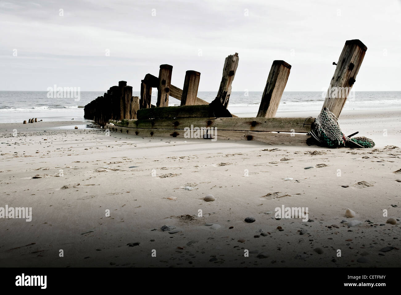 View of old water breakers and the sandy beach at Spurn Point Stock ...