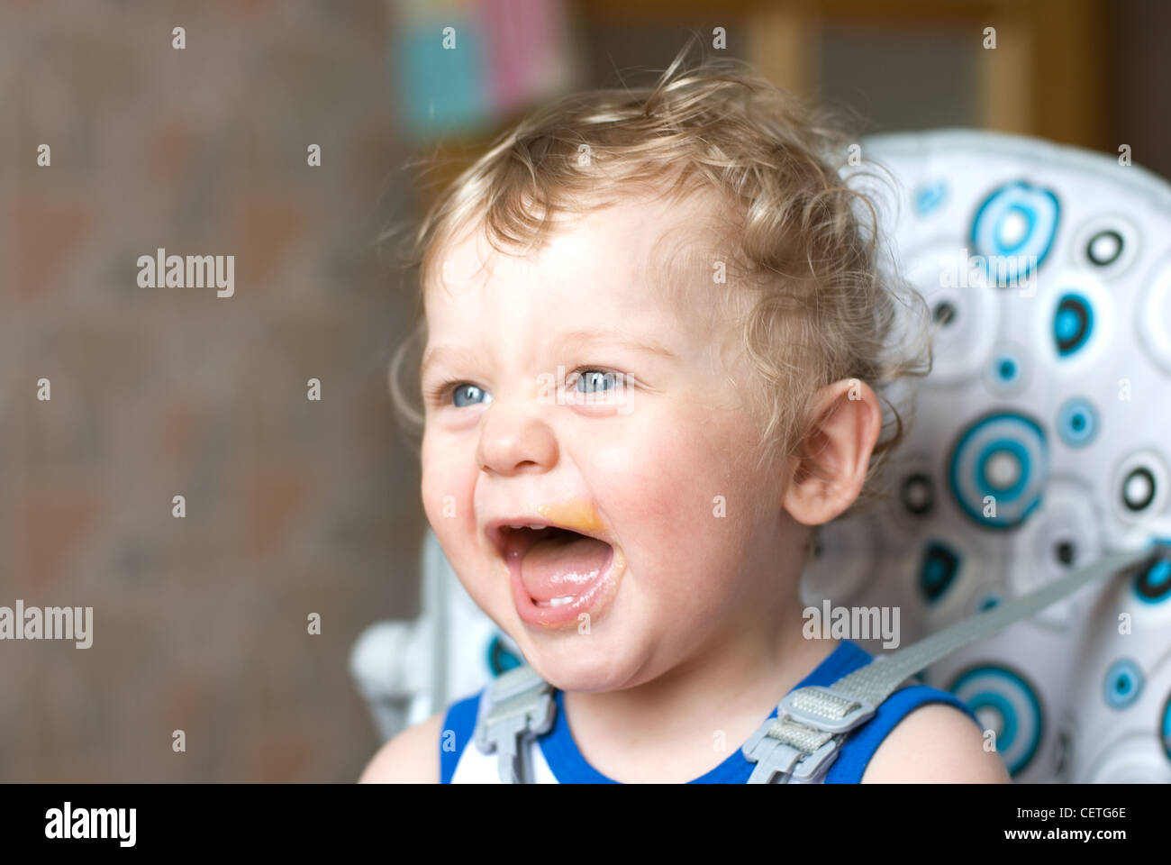 Messy smiling baby boy after eating Stock Photo - Alamy