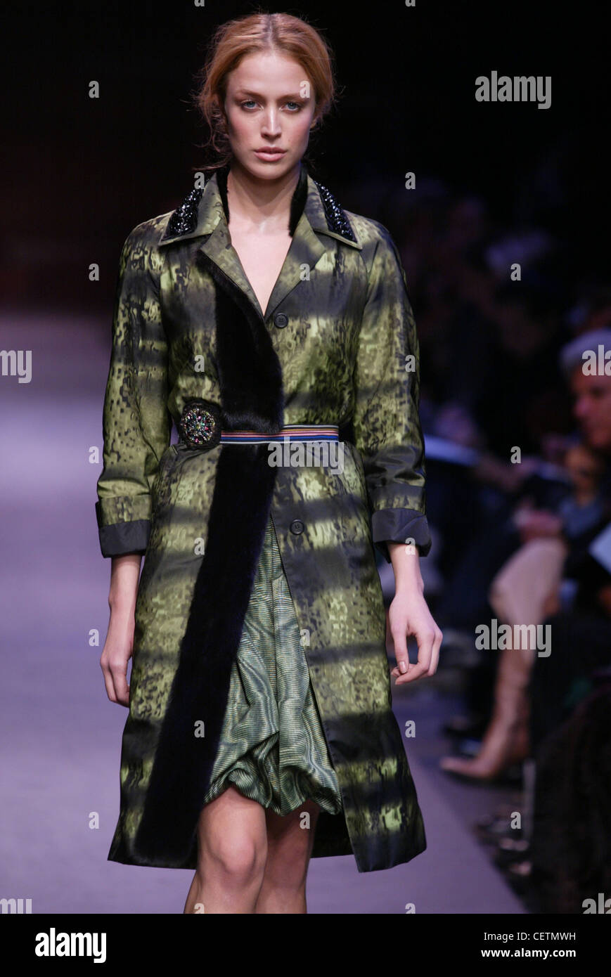 Prada Milan Autumn Winter Model brunette hair off face, wearing knee ...