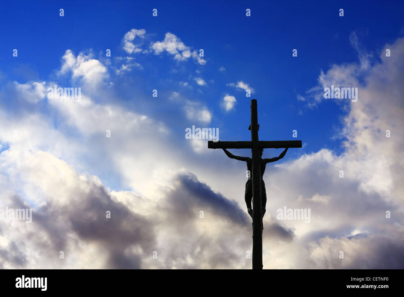 Cross in a blue sky Stock Photo - Alamy