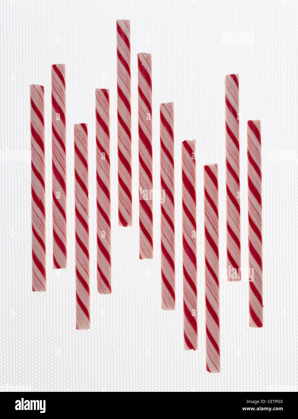 A pattern of eleven straight red and white striped candy canes Stock ...