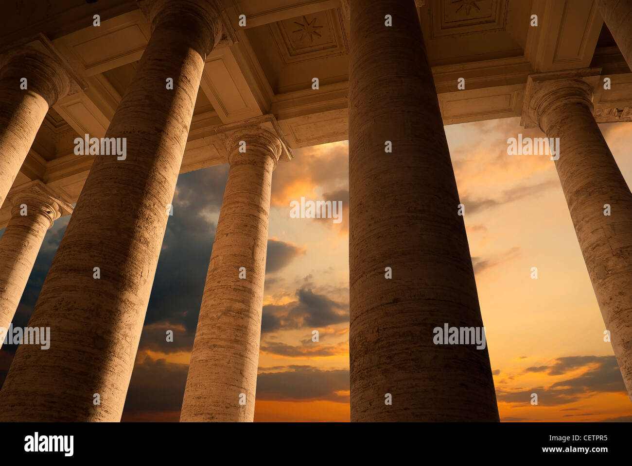 Famous colonnade of St. Peter's Basilica in Vatican at sunset, Rome ...