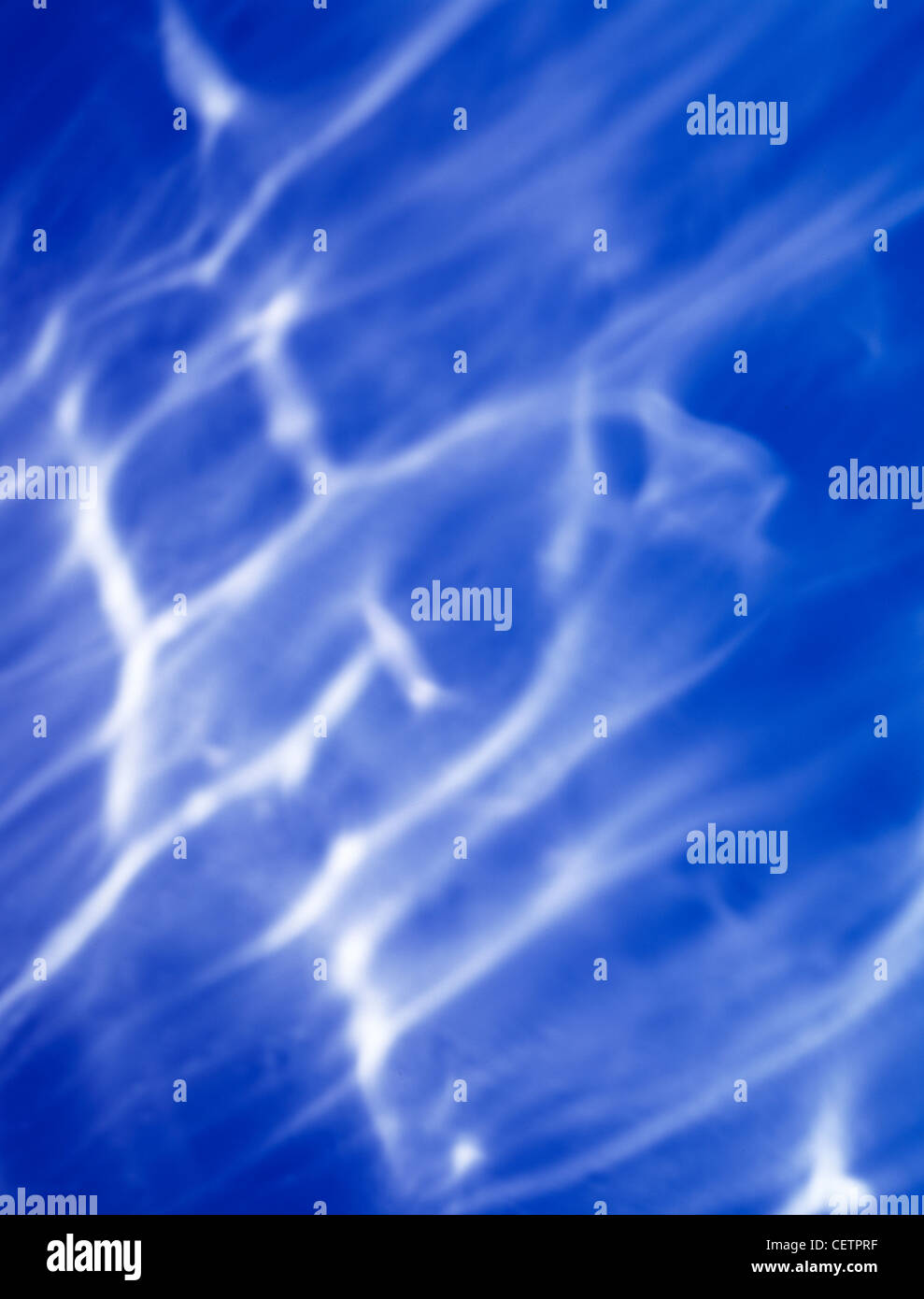 White reflections in blue ocean water. Soft focus Stock Photo - Alamy