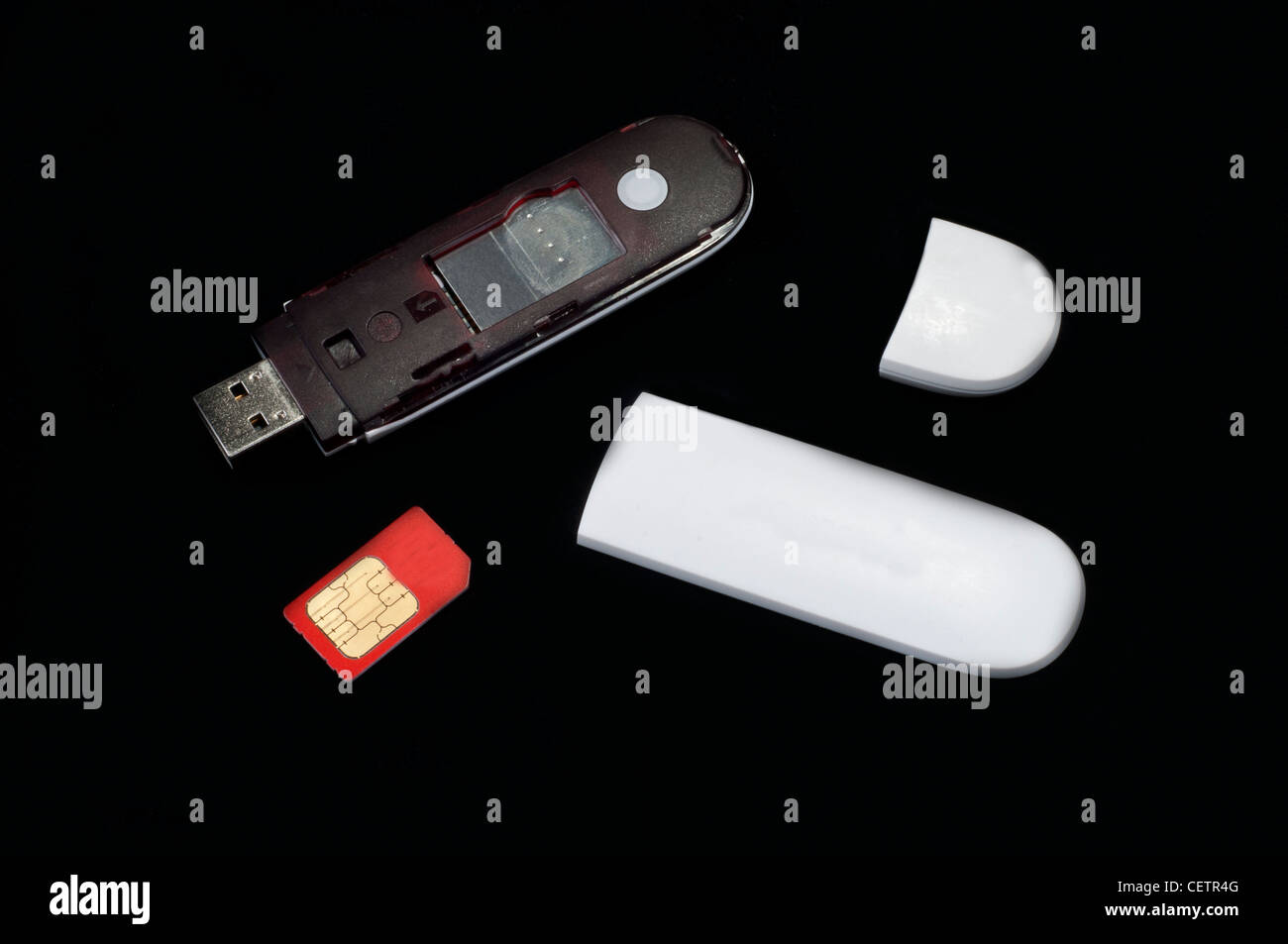 3g mobile moden and sim card parts on isolated black background Stock ...