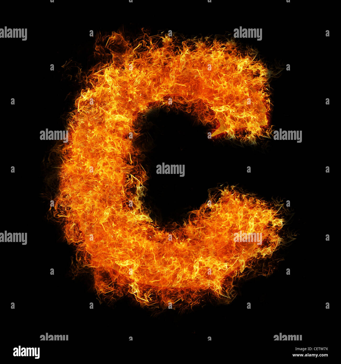 Fire letter C on a black background Stock Photo - Alamy