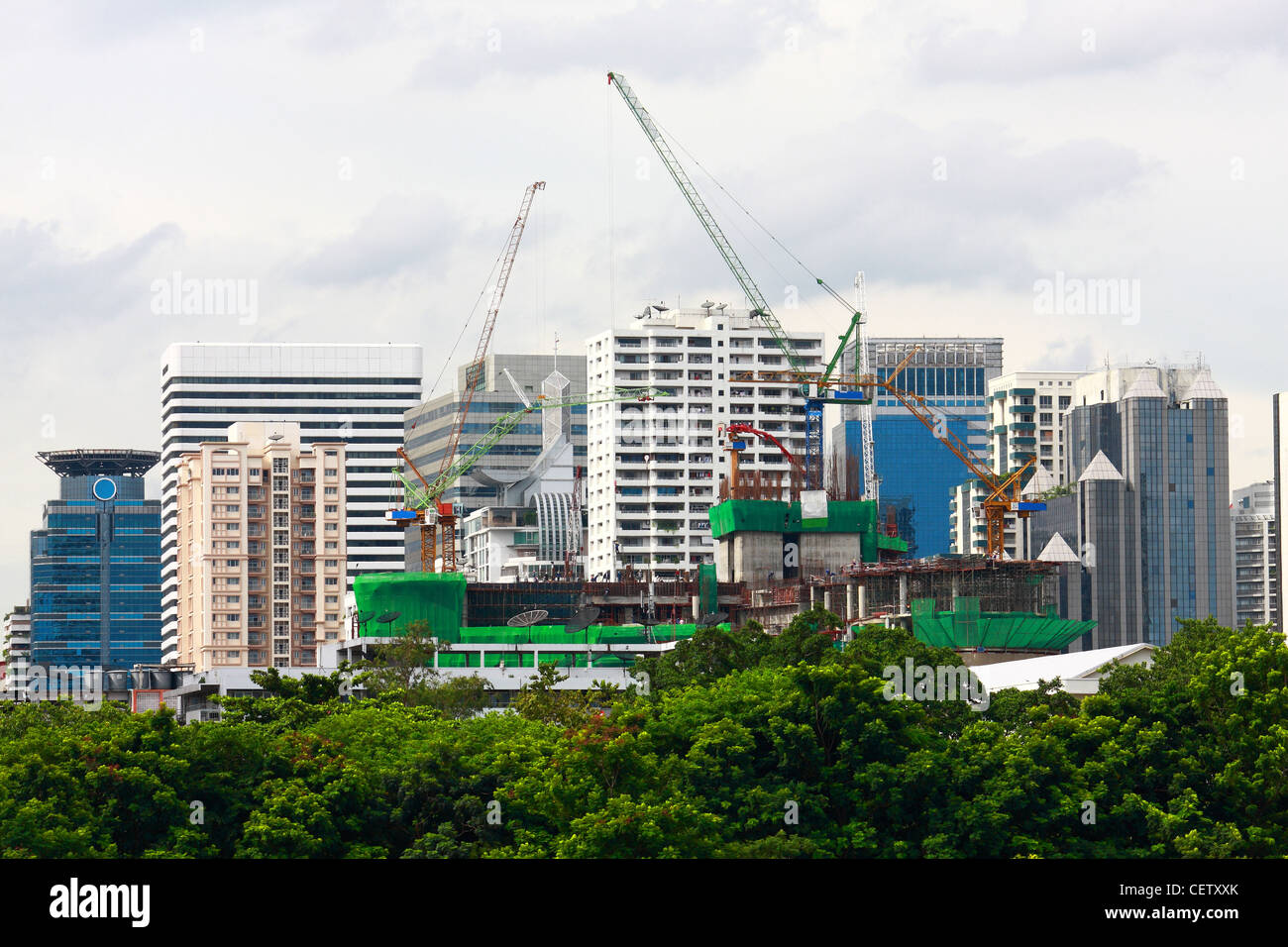 building growth in city Stock Photo - Alamy