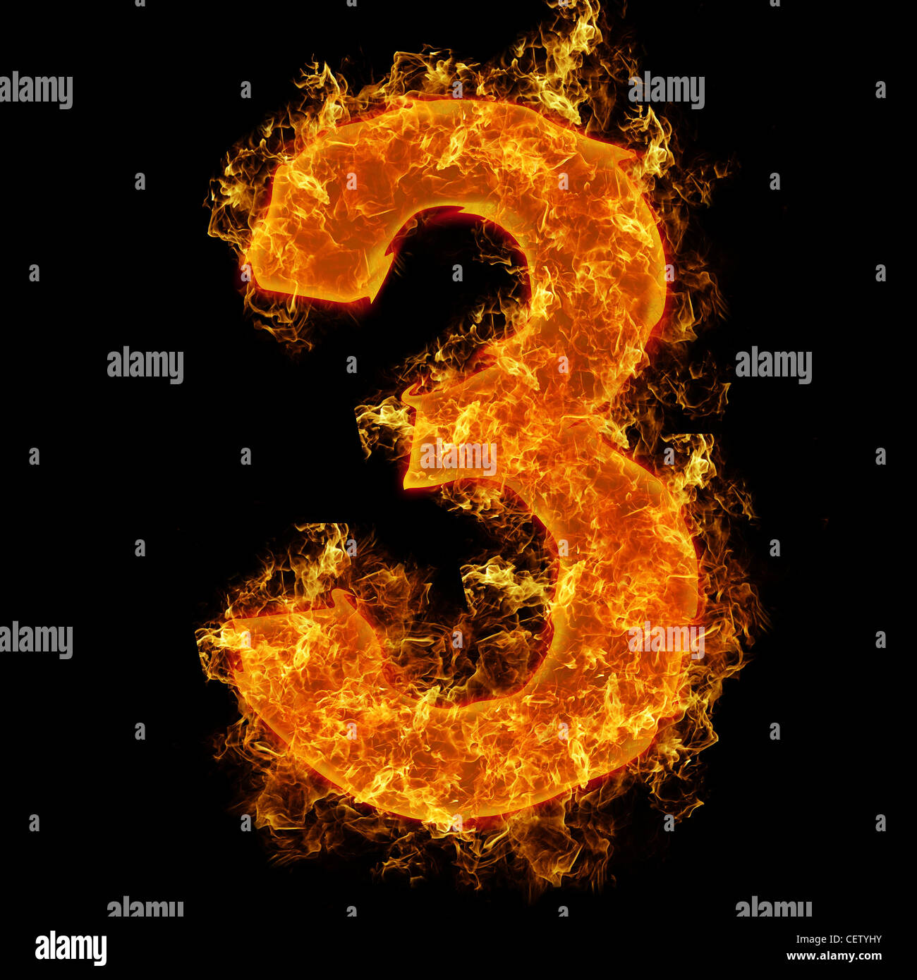 Fire number 3 on a black background Stock Photo - Alamy