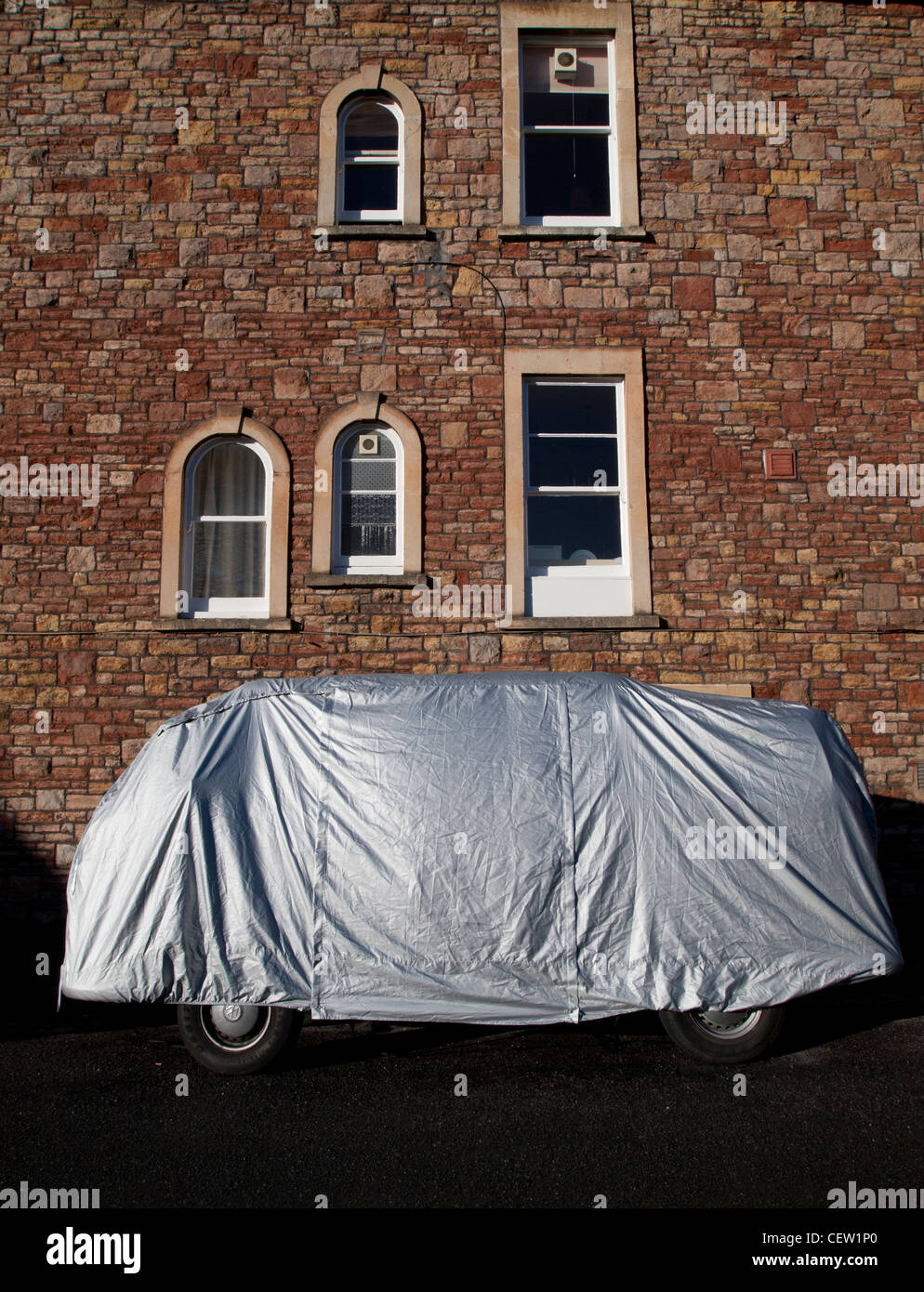 VW camper van with weather cover outside Victorian house Stock Photo ...