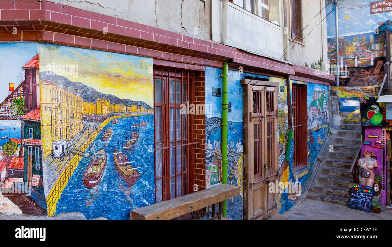 ValparaIso Chile. South America. Murals on buildings at base of stairs ...