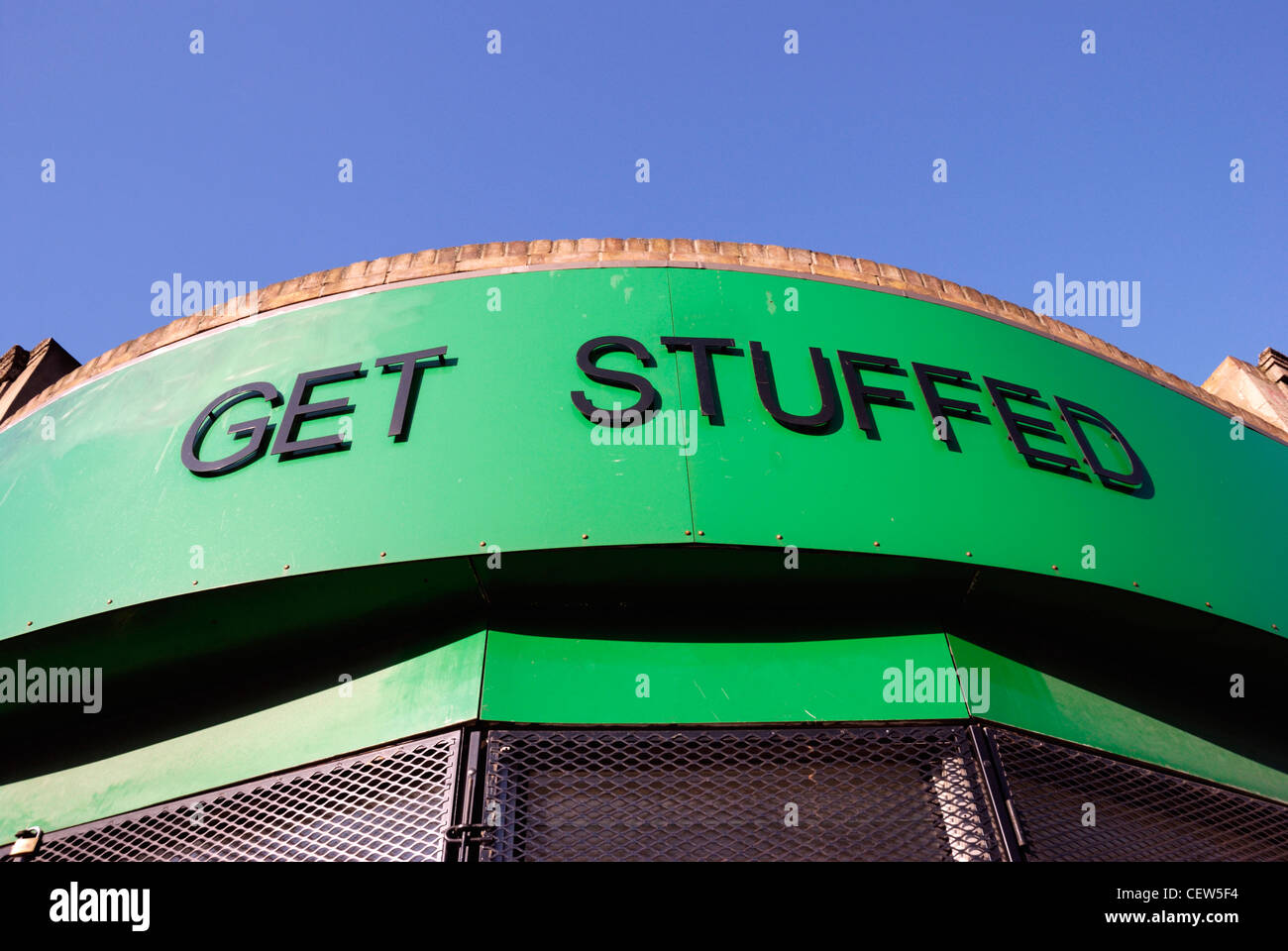 ' Get Stuffed ' sign above a shop Stock Photo - Alamy