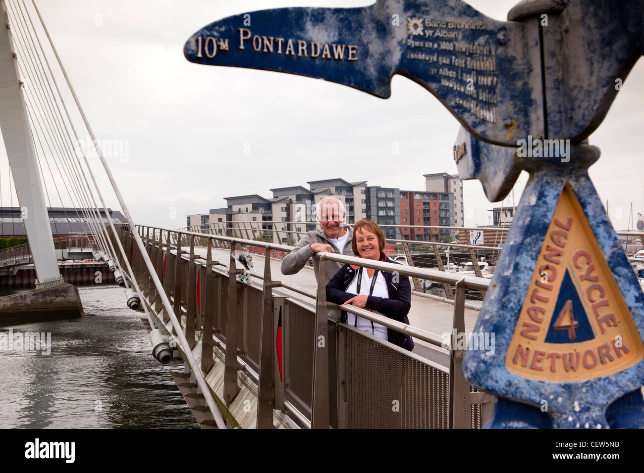 UK, Wales, Swansea, visitors on sailbridge over River Tawe, linking ...