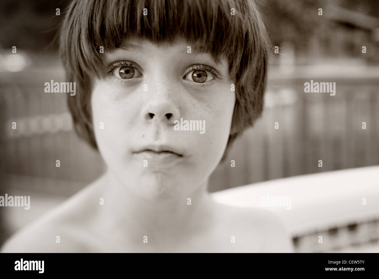 Serious boy with big eyes hi-res stock photography and images - Alamy