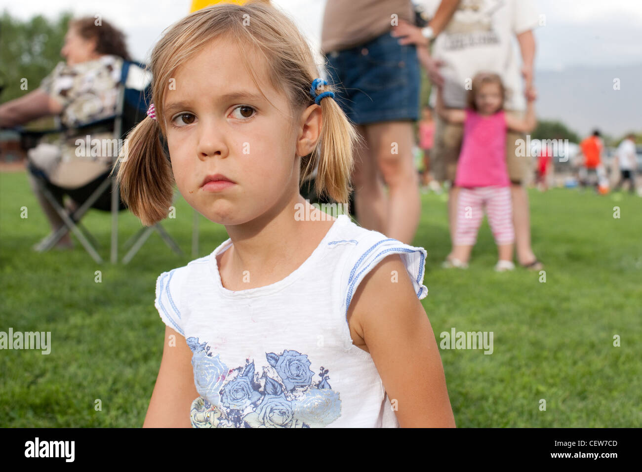 GIrl looking nervous, uncertain Stock Photo - Alamy