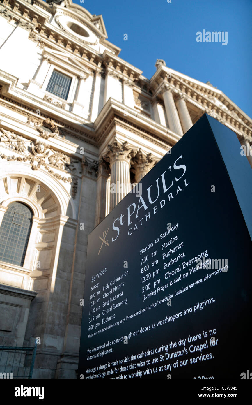 View looking up at St Paul's Cathedral sign in front of the church ...