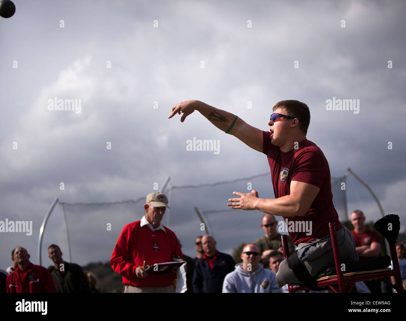 Lance Cpl. Ron Sullivan, a Wounded Warrior with the East Team, throws a ...
