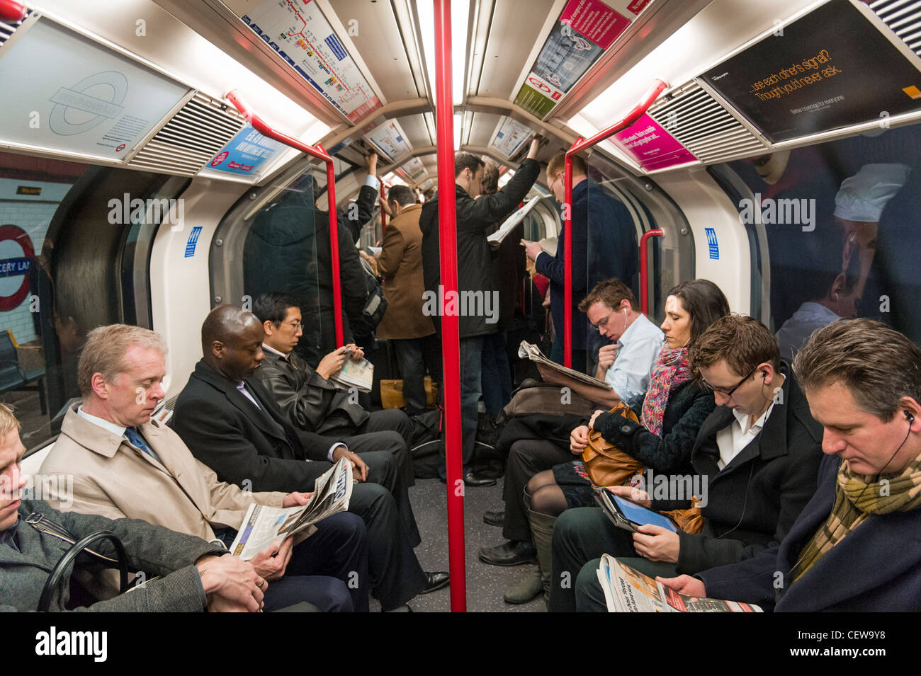 Commuters on Central Line London Underground carriage, UK Stock Photo ...