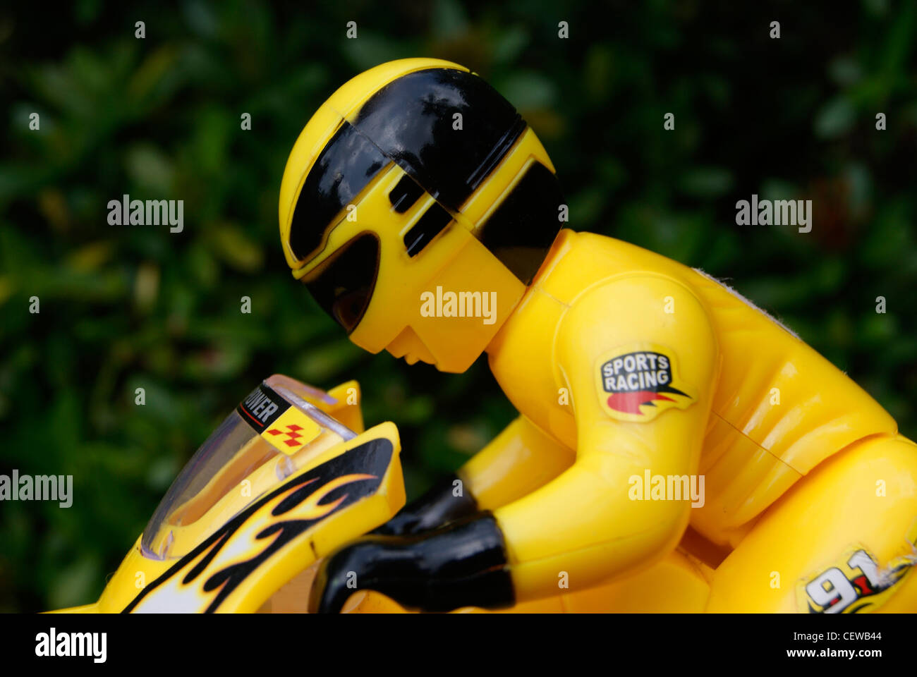 Stylish Toy Bike Racer in Racing Position Close up View Stock Photo - Alamy