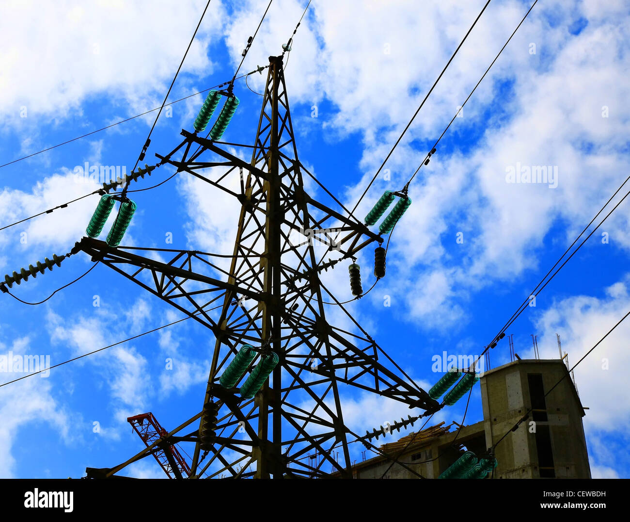 House under construction, electricity pylon against cloudy sky Stock ...