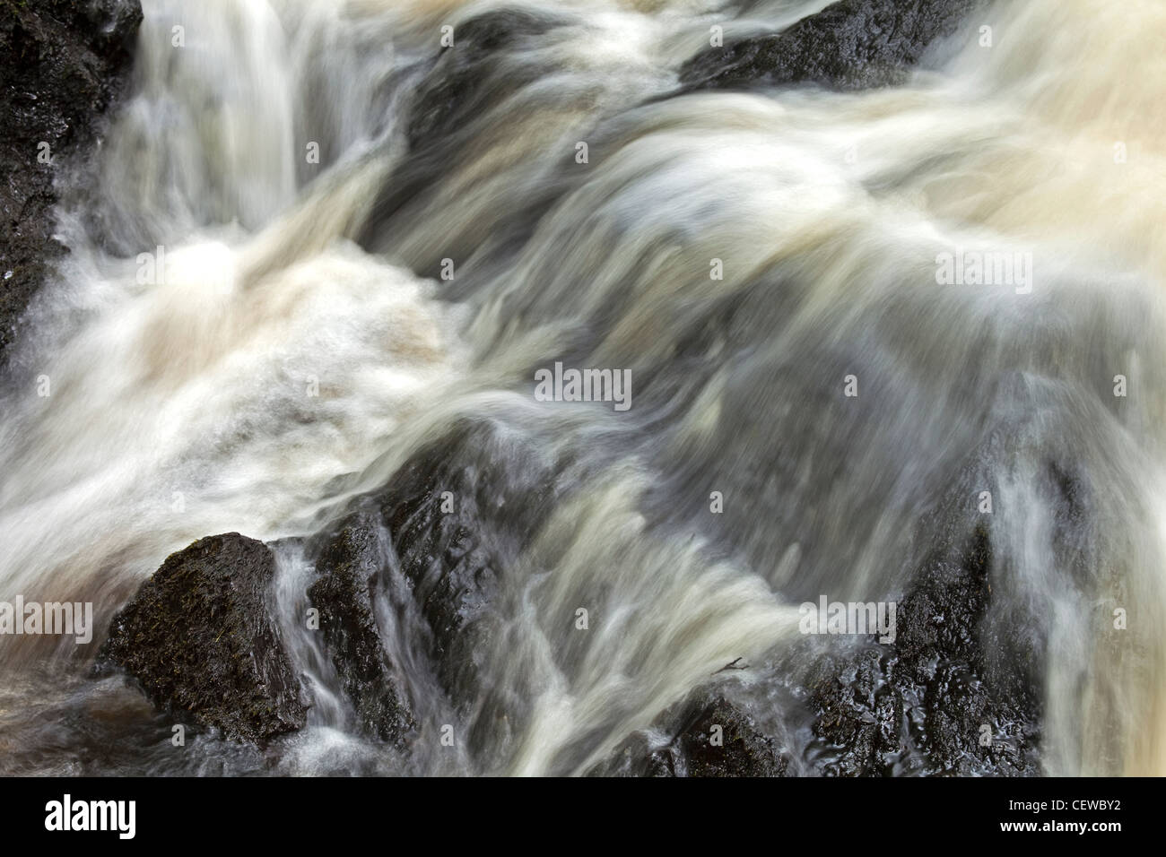 Image of water rushing over rocks hi-res stock photography and images ...