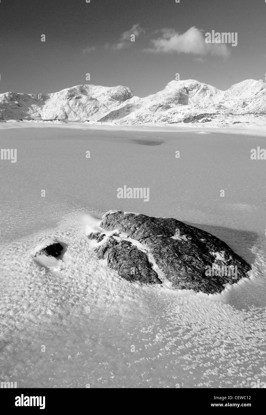 Black and white image of frozen Three Tarns with Scafell and Scafell ...