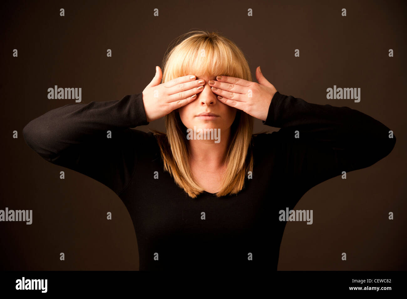 Hand over eye hi-res stock photography and images - Alamy